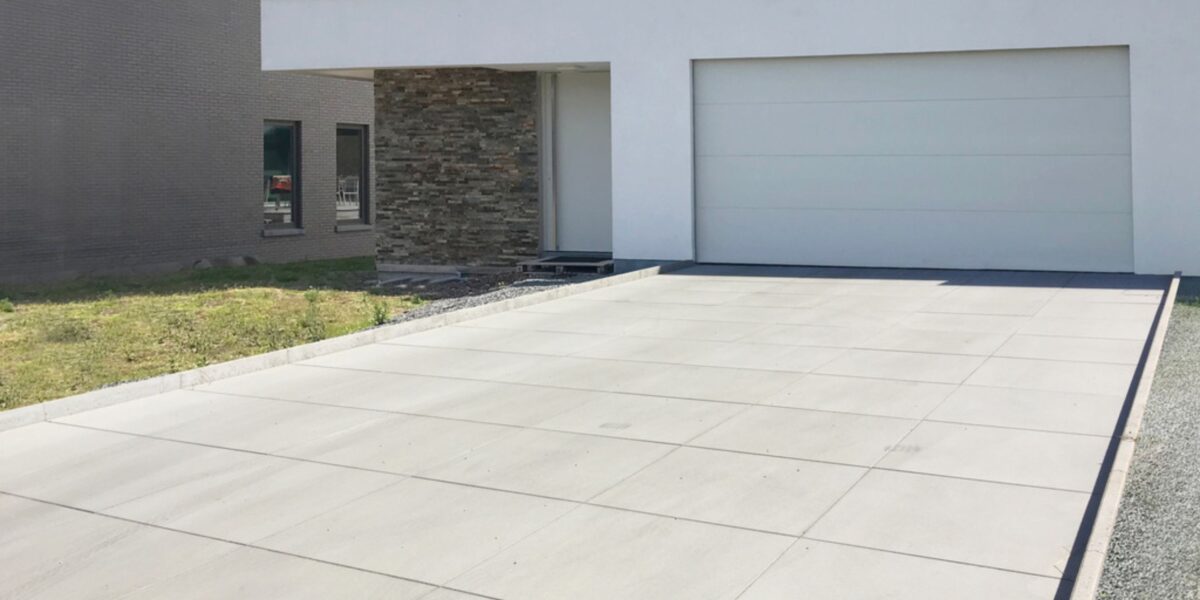 Oprit aanleggen: materialen & prijzen [Complete gids 2025 ]